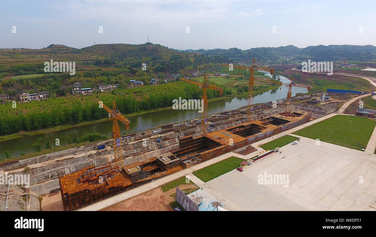 An aerial view of the construction site of a full-scale replica of the ...