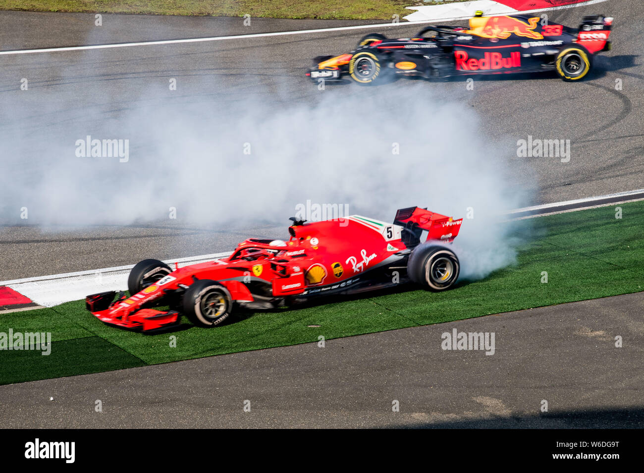 German F1 Sebastian Vettel of Ferrari and Dutch F1 driver Max ...