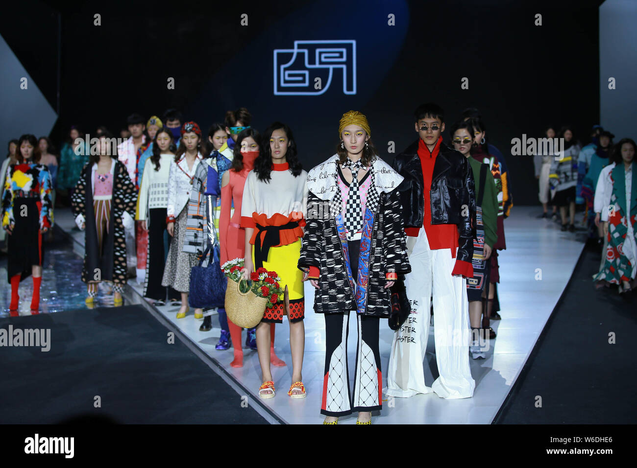 Models display creations of knitwears by graduates during a fashion ...