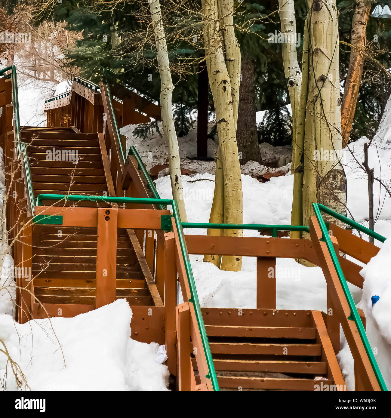 Square frame Outdoor stairs on a mountain slope covered with snow ...