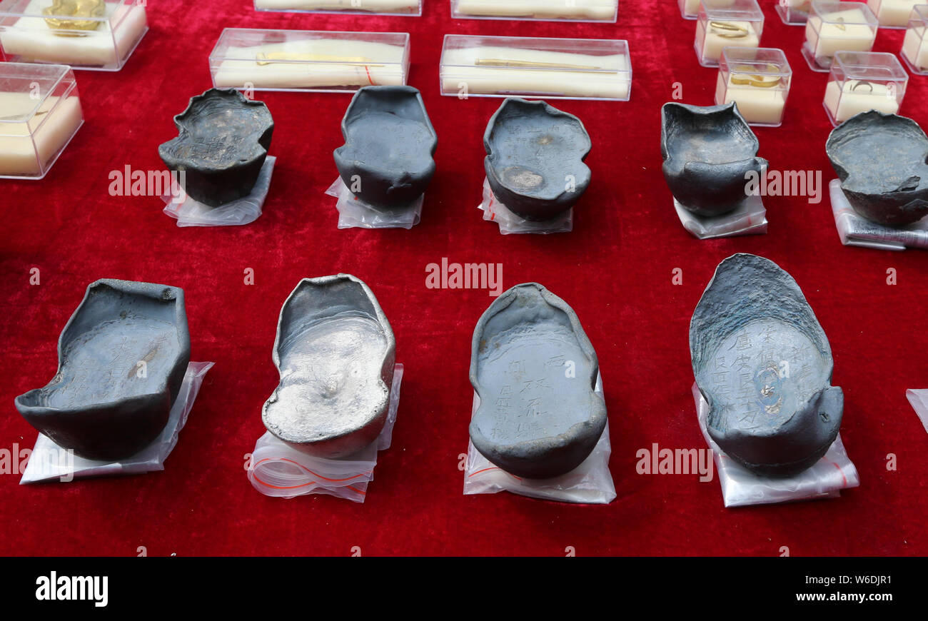 Silver ingots unearthed from the sunken boats owned by peasant leader ...