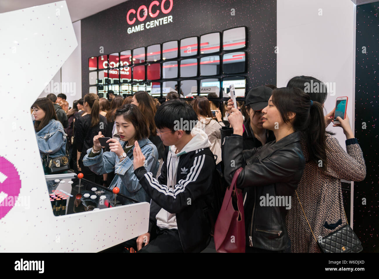People visit the Coco Game Center of Chanel in Shanghai, China, 15 ...
