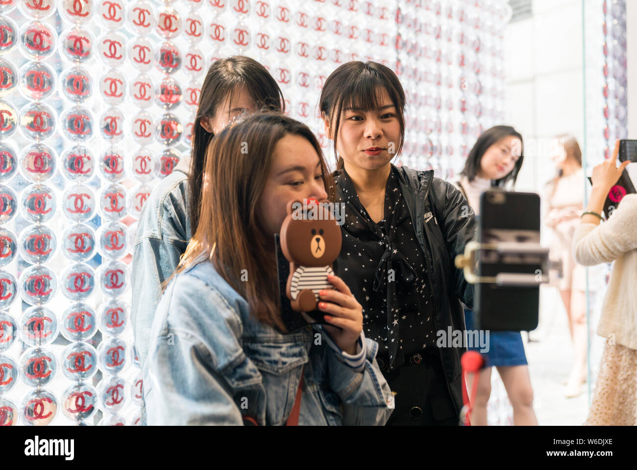 People visit the Coco Game Center of Chanel in Shanghai, China, 15 ...