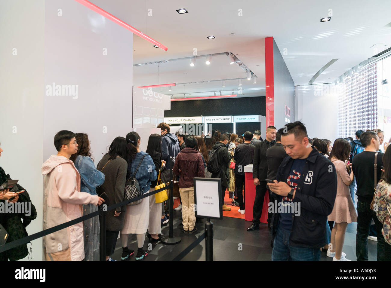 People visit the Coco Game Center of Chanel in Shanghai, China, 15 ...