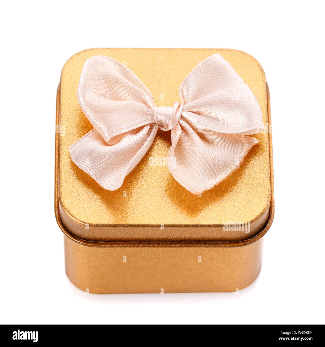 Single gold gift box with bow isolated Stock Photo - Alamy