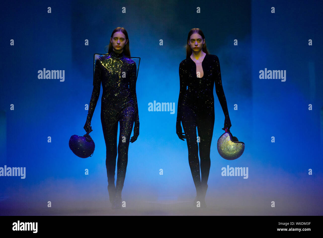 Russian twin models Lia and Odette Pavlova display new creations at the ...