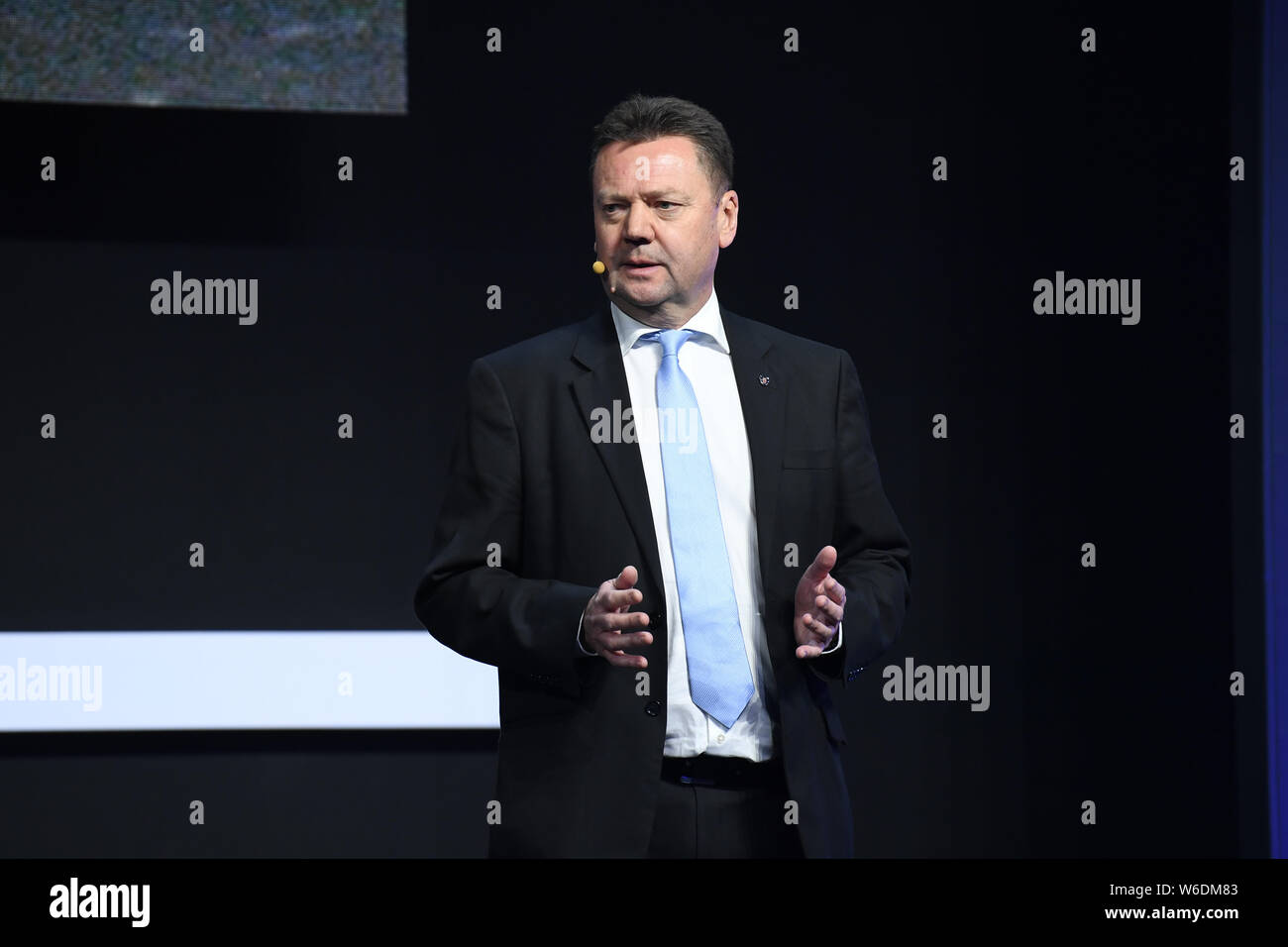 Steve Wager, Managing Director of Scania China, speaks during the ...