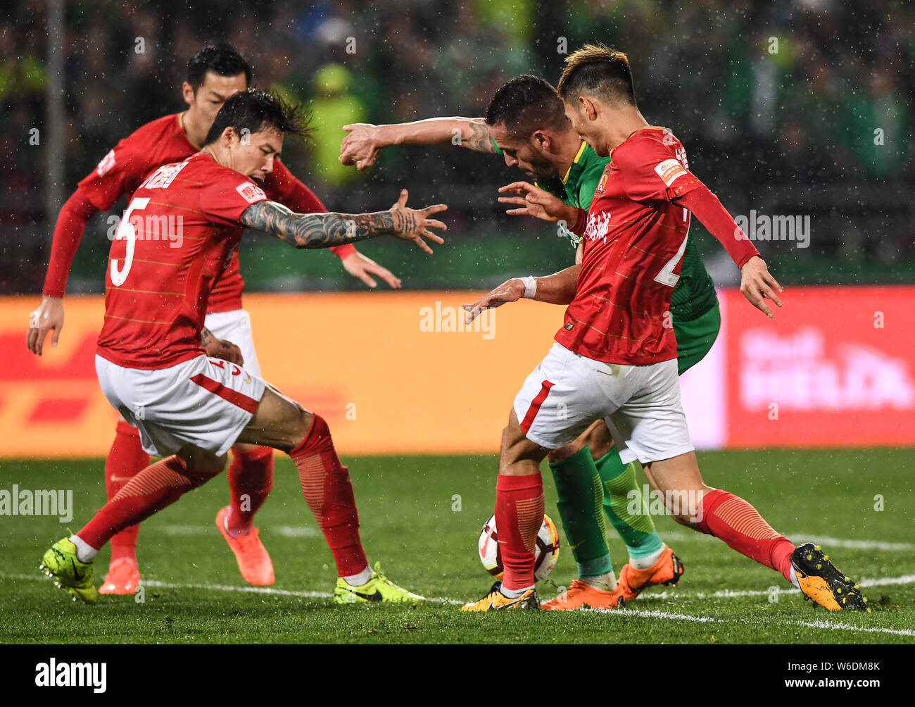 Brazilian football player Renato Soares de Oliveira Augusto, back right ...