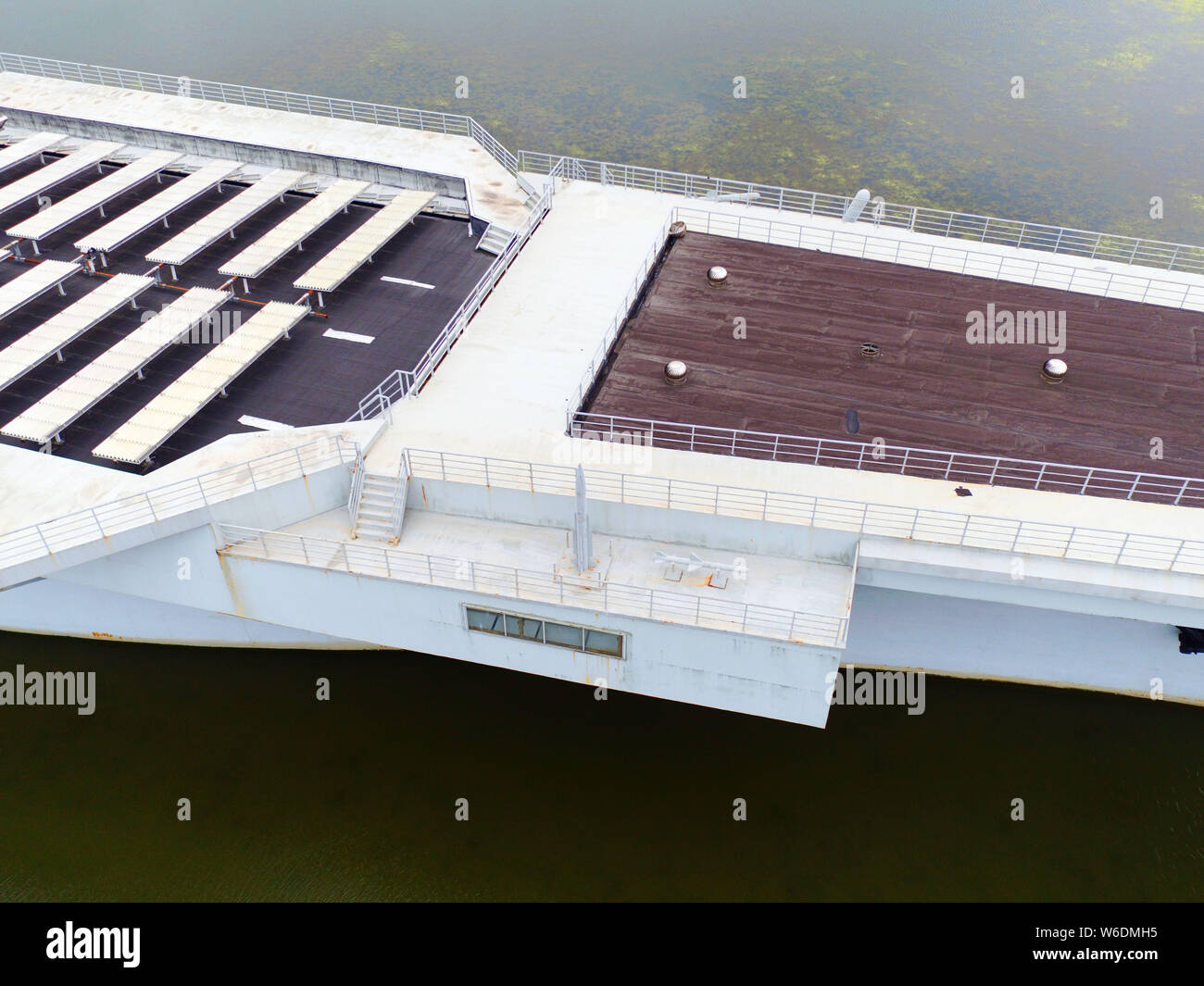 An aerial view of a building that resembles an "aircraft carrier ...