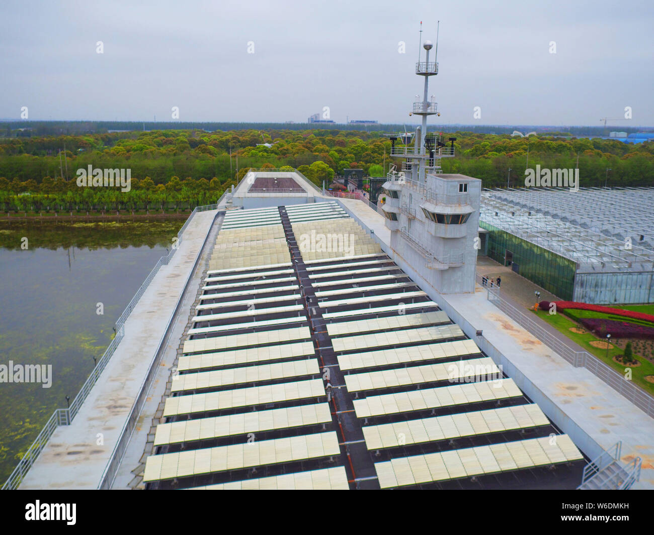 An aerial view of a building that resembles an "aircraft carrier ...