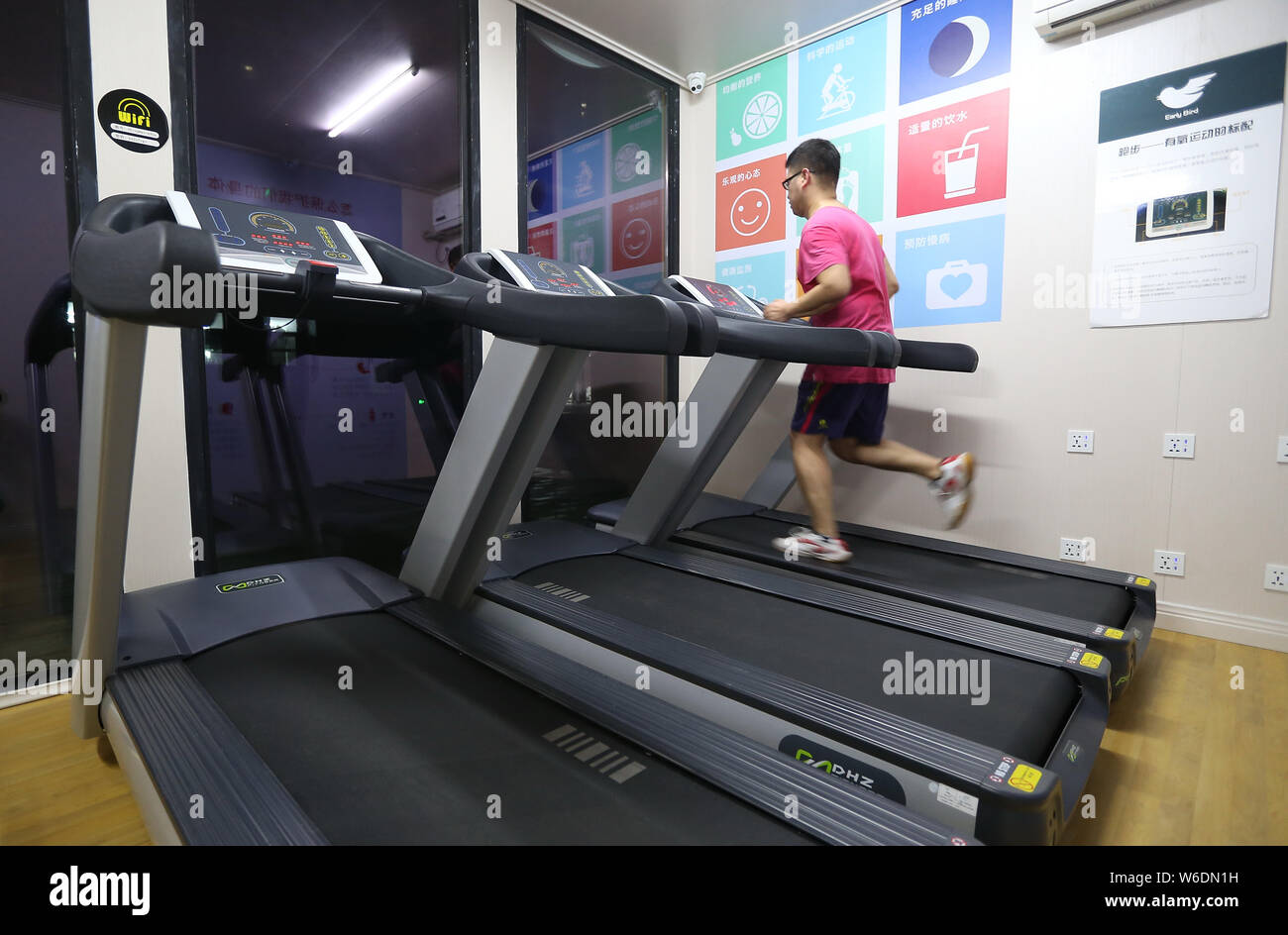 A citizen exercises in the shared gym in Chengdu city, southwest China ...