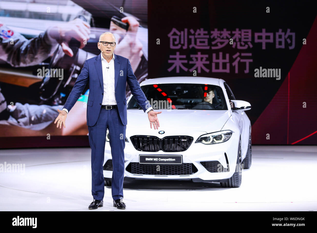 A member of the Board of Management of BMW AG, speaks next to the All ...