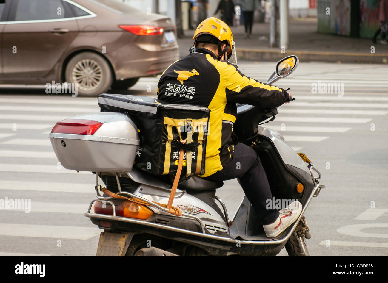 Food delivery on motorbike in hi-res stock photography and images - Alamy
