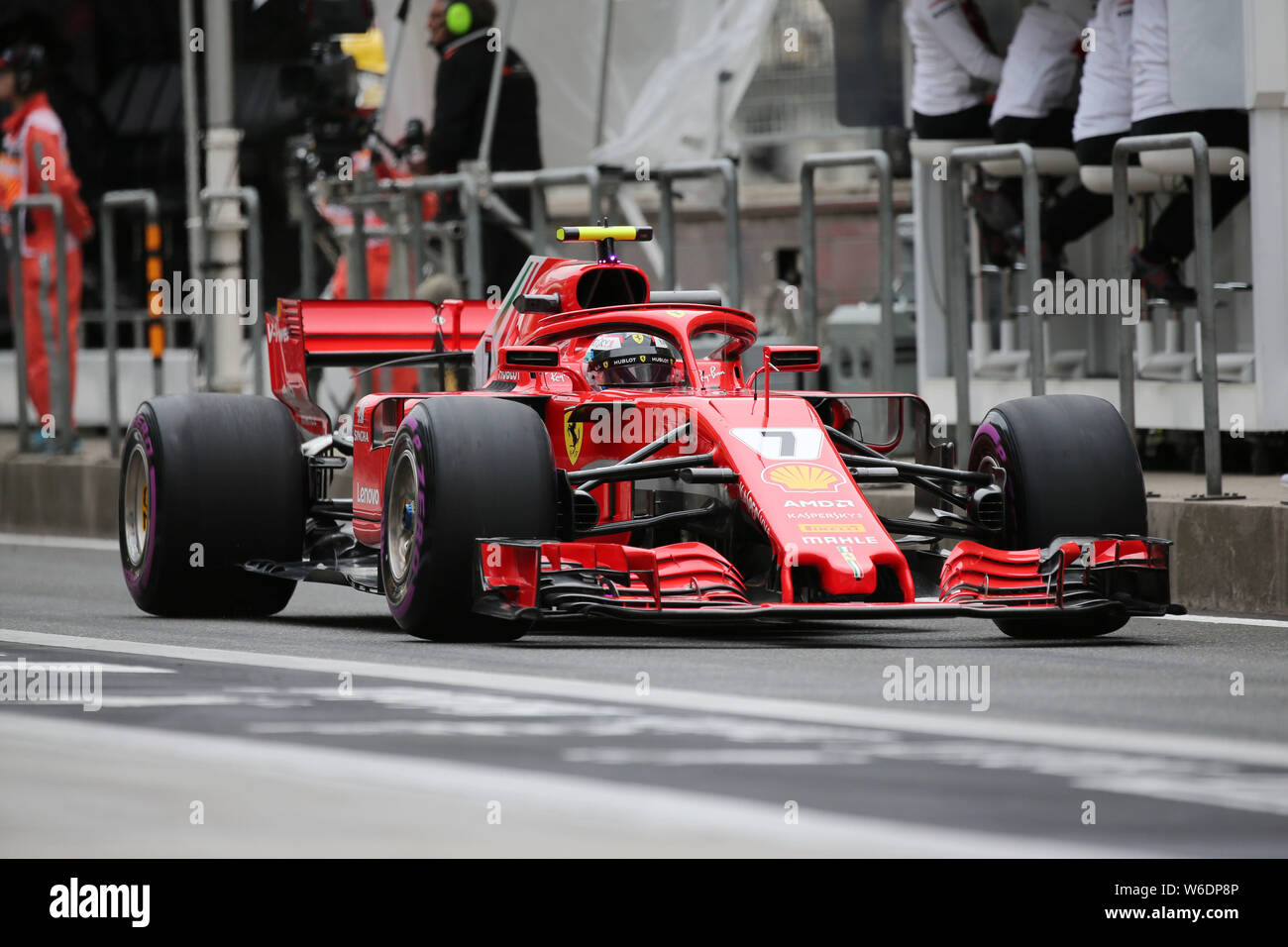 Finnish F1 driver Kimi Raikkonen of Ferrari enters the pit during a ...