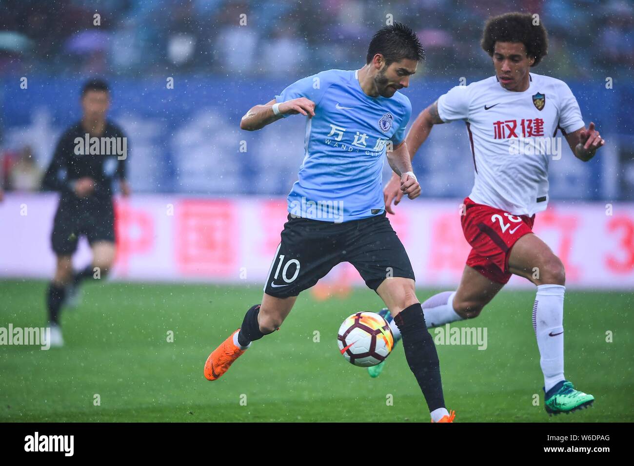 Belgian football player Yannick Ferreira Carrasco, left, of Dalian ...