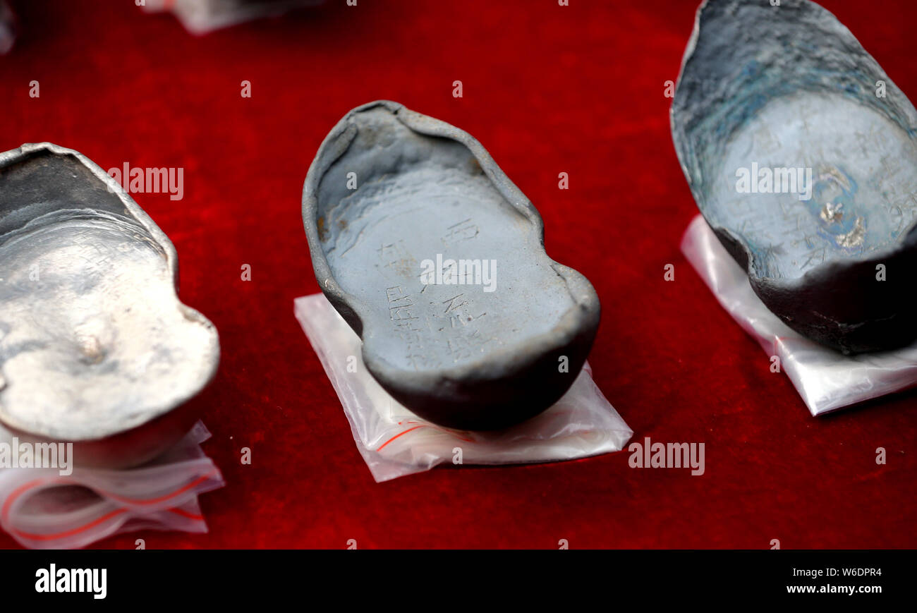 Silver ingots unearthed from the sunken boats owned by peasant leader ...
