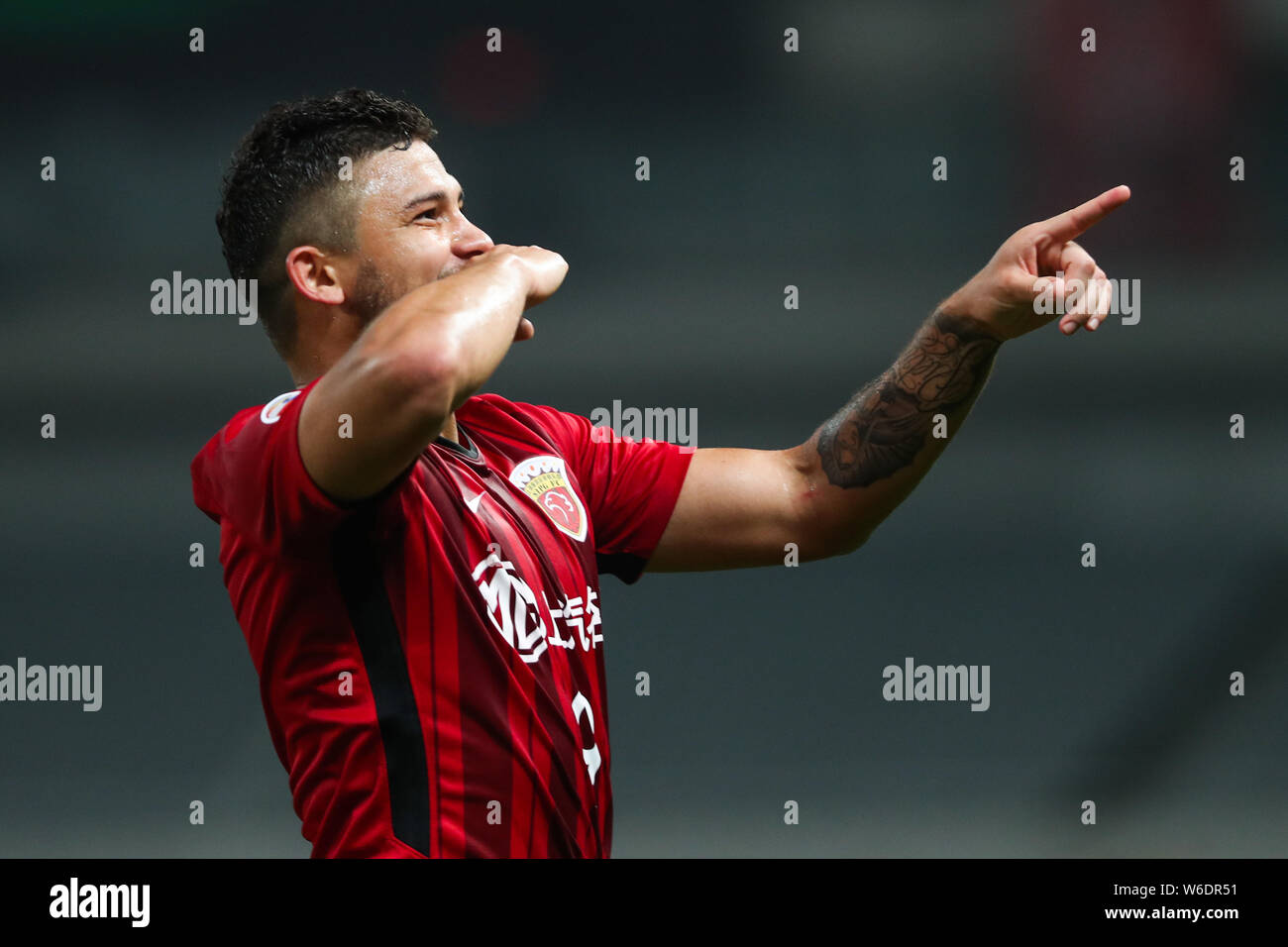 Brazilian football player Elkeson of China's Shanghai SIPG FC poses to ...