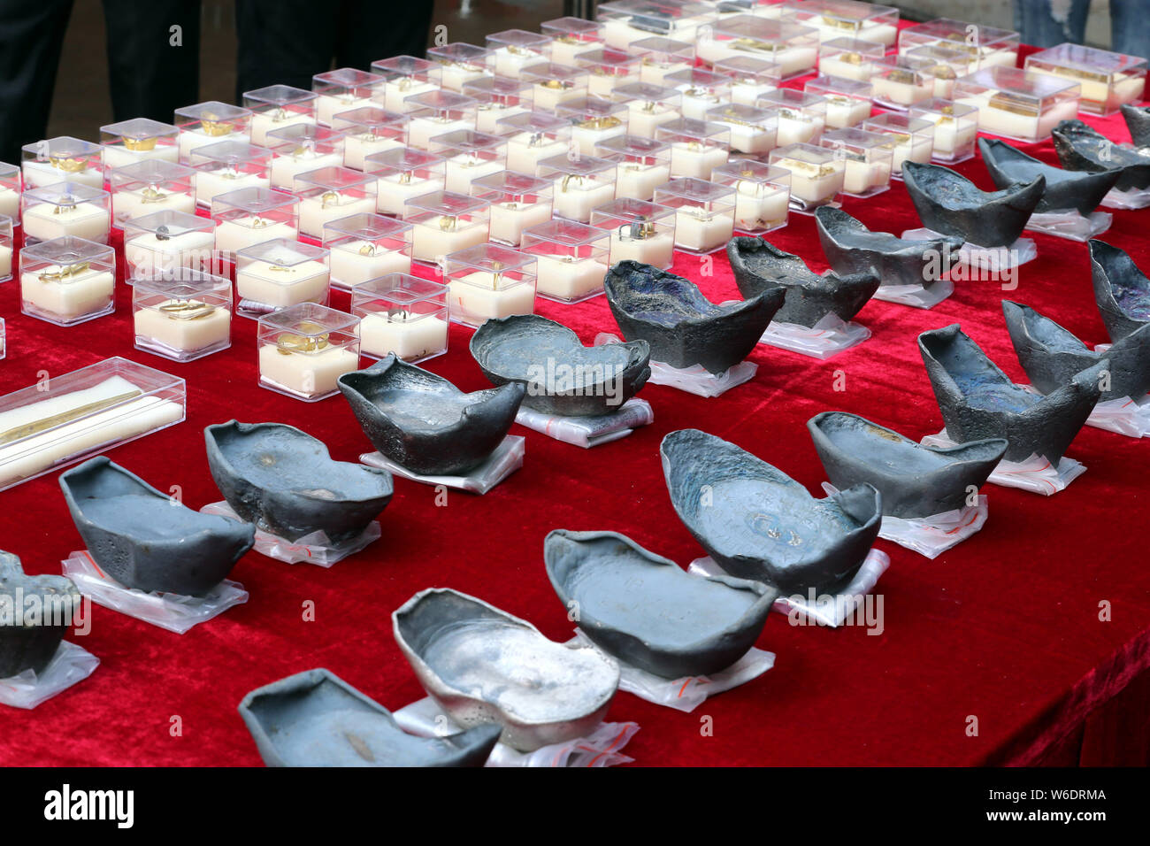 Silver ingots unearthed from the sunken boats owned by peasant leader ...