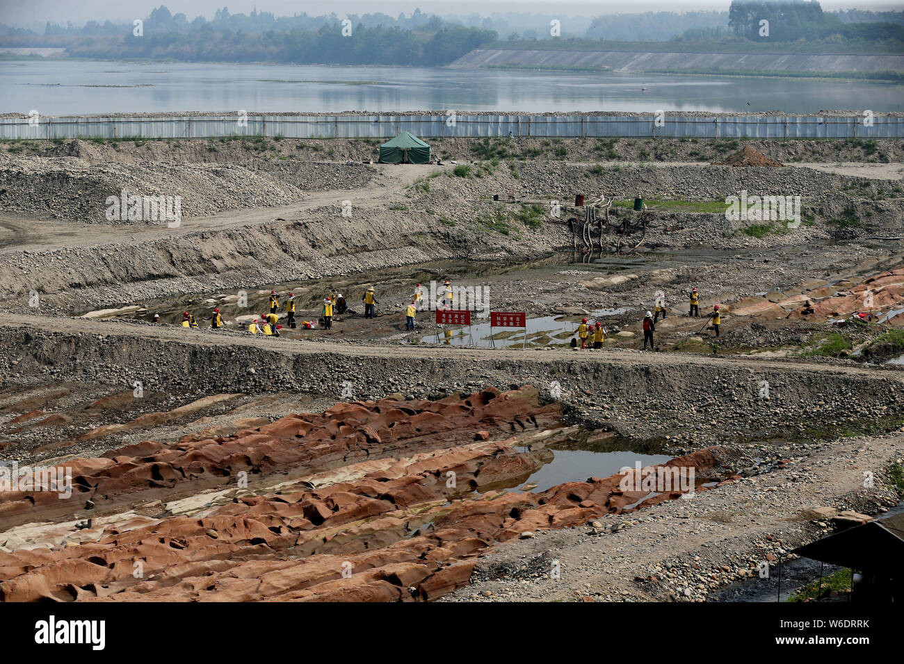 An aerial view of the excavation site of the sunken boats owned by ...