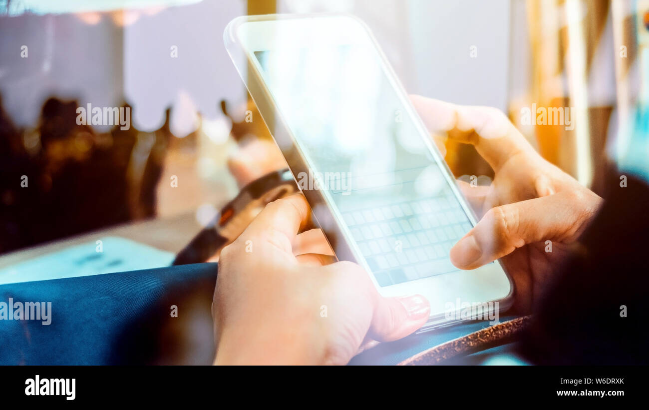 Hands with mobile, double exposure Stock Photo - Alamy