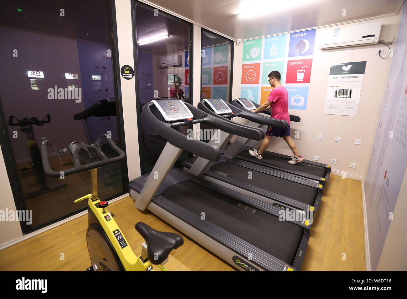 A citizen exercises in the shared gym in Chengdu city, southwest China ...