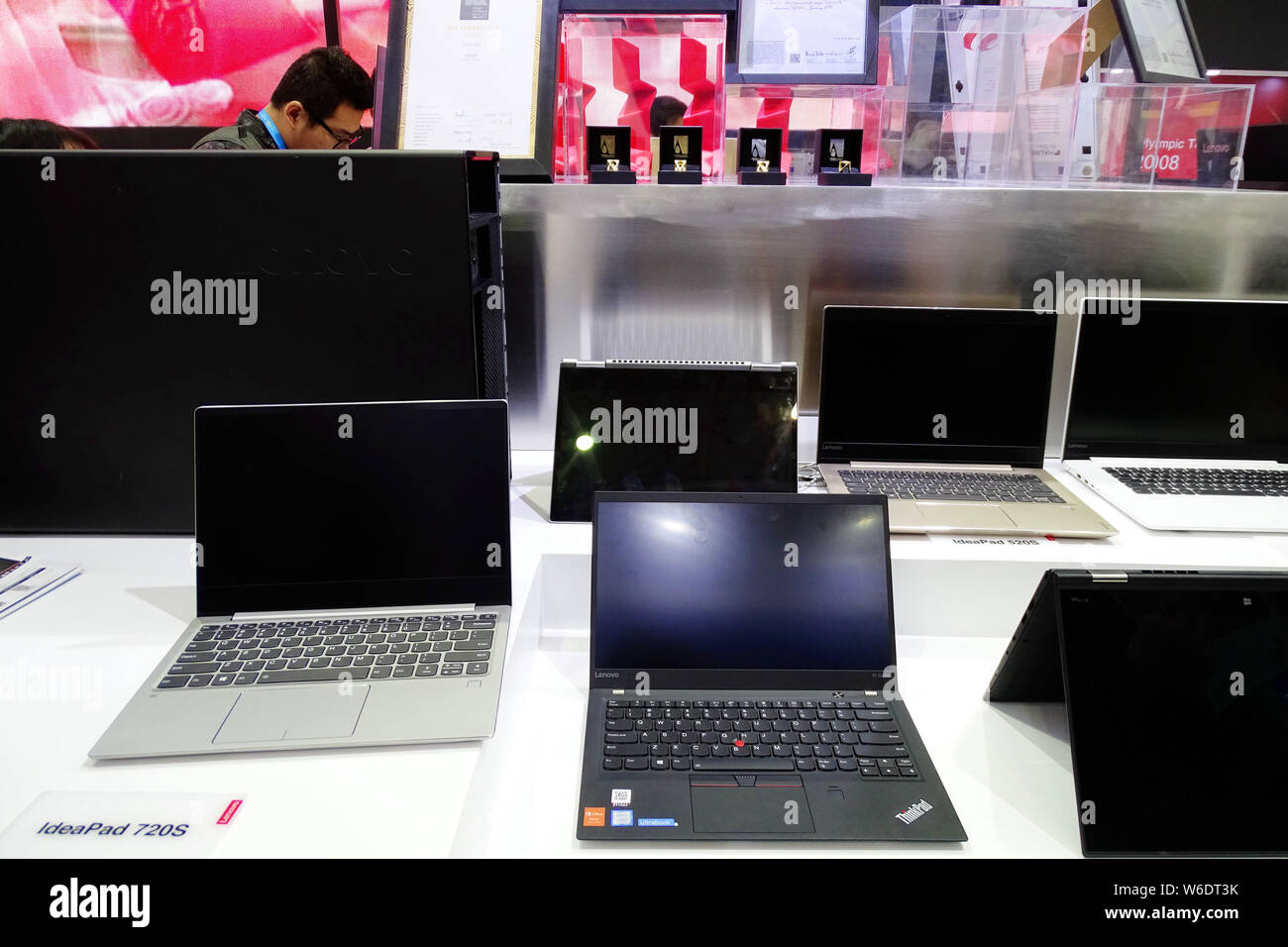 --FILE--Laptop computers are on display at the stand of Lenovo during ...