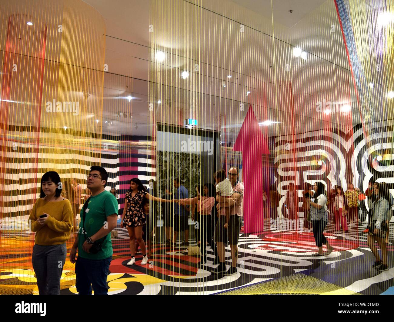 Visitors view an artwork by Los Angeles-based artist Pae White on ...