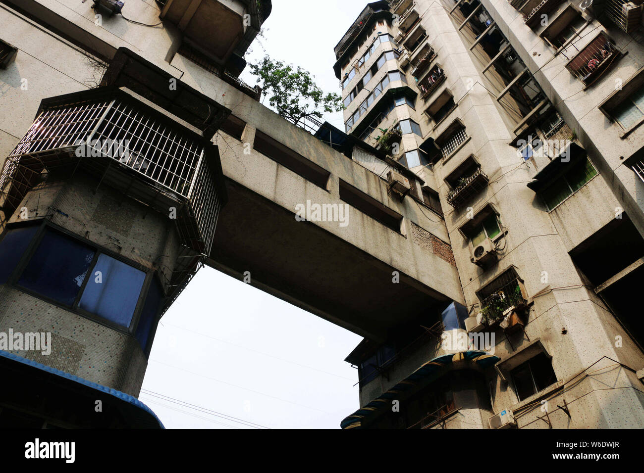 A worm's eye view of a 14-storey high corridor linking two of the six ...