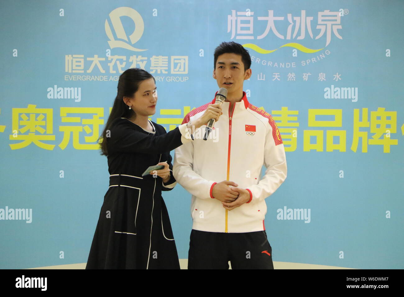 Chinese short track speed skater Wu Dajing, right, the winner of the ...