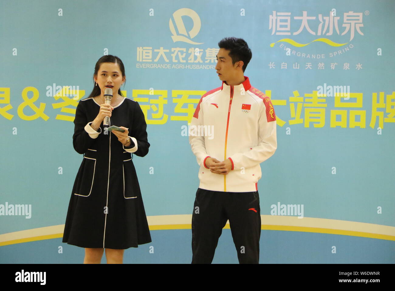 Chinese short track speed skater Wu Dajing, right, the winner of the ...