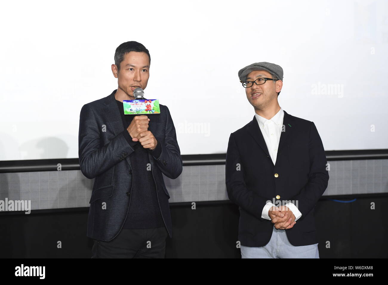 Japanese animator and director Hiromasa Yonebayashi, right, and ...