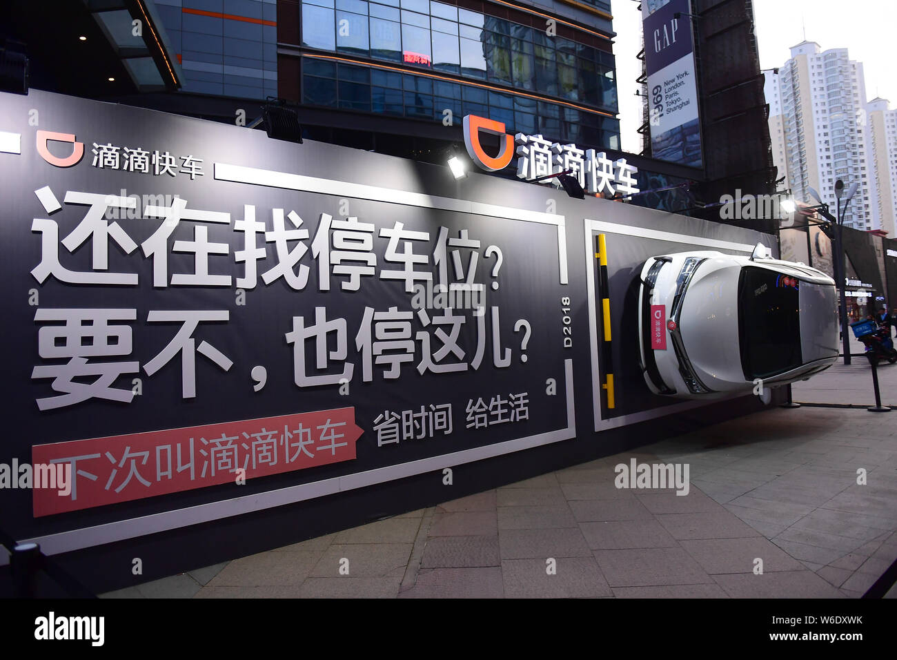 An advertisement for taxi-hailing and car-service app Didi Chuxing is ...