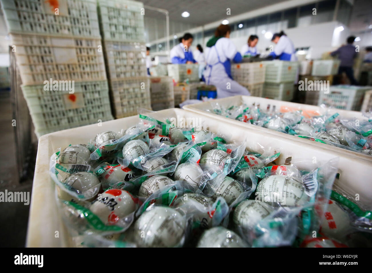 Salted duck eggs are packaged in Gaoyou, Yangzhou city, east China's ...