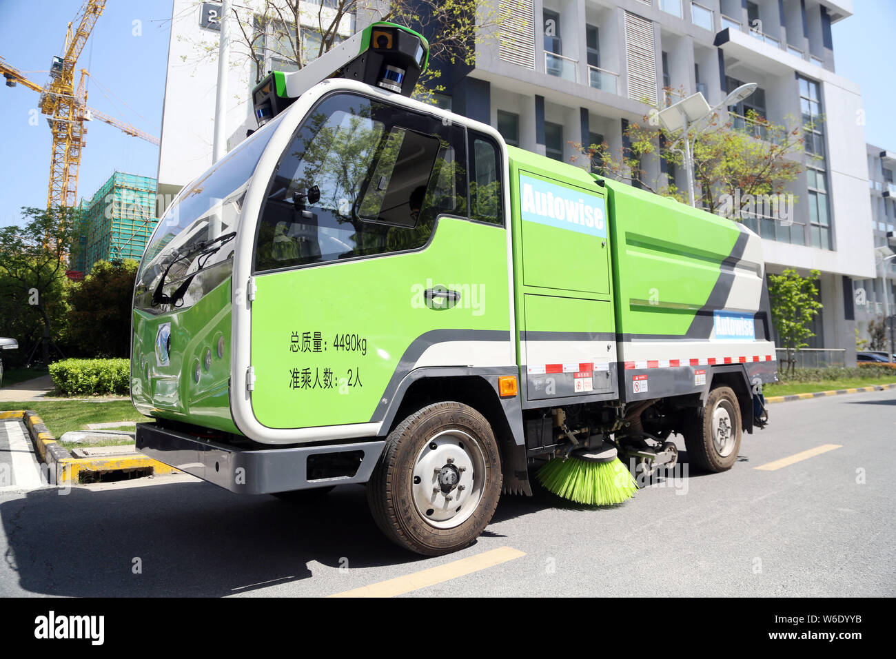 The world's first electric driverless sanitation truck is pictured on a ...