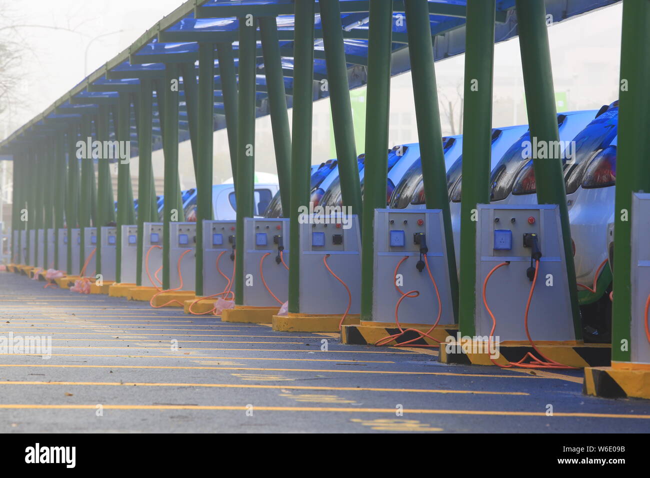 --FILE--View of charging poles for electric compact cars at an EV ...
