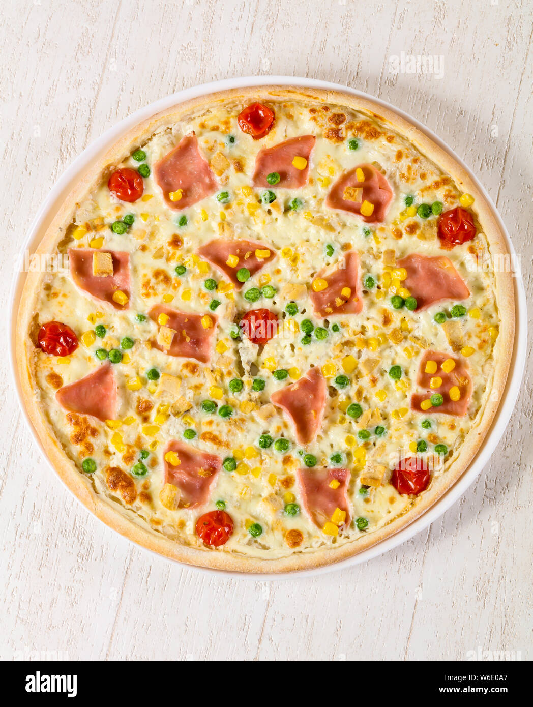Pizza with ham and cheese Stock Photo - Alamy