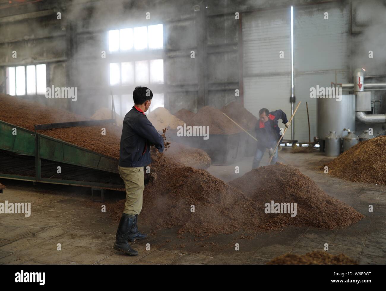 Chinese workers produces Bijie Daqu, a sub-brand Chinese liquor derived ...