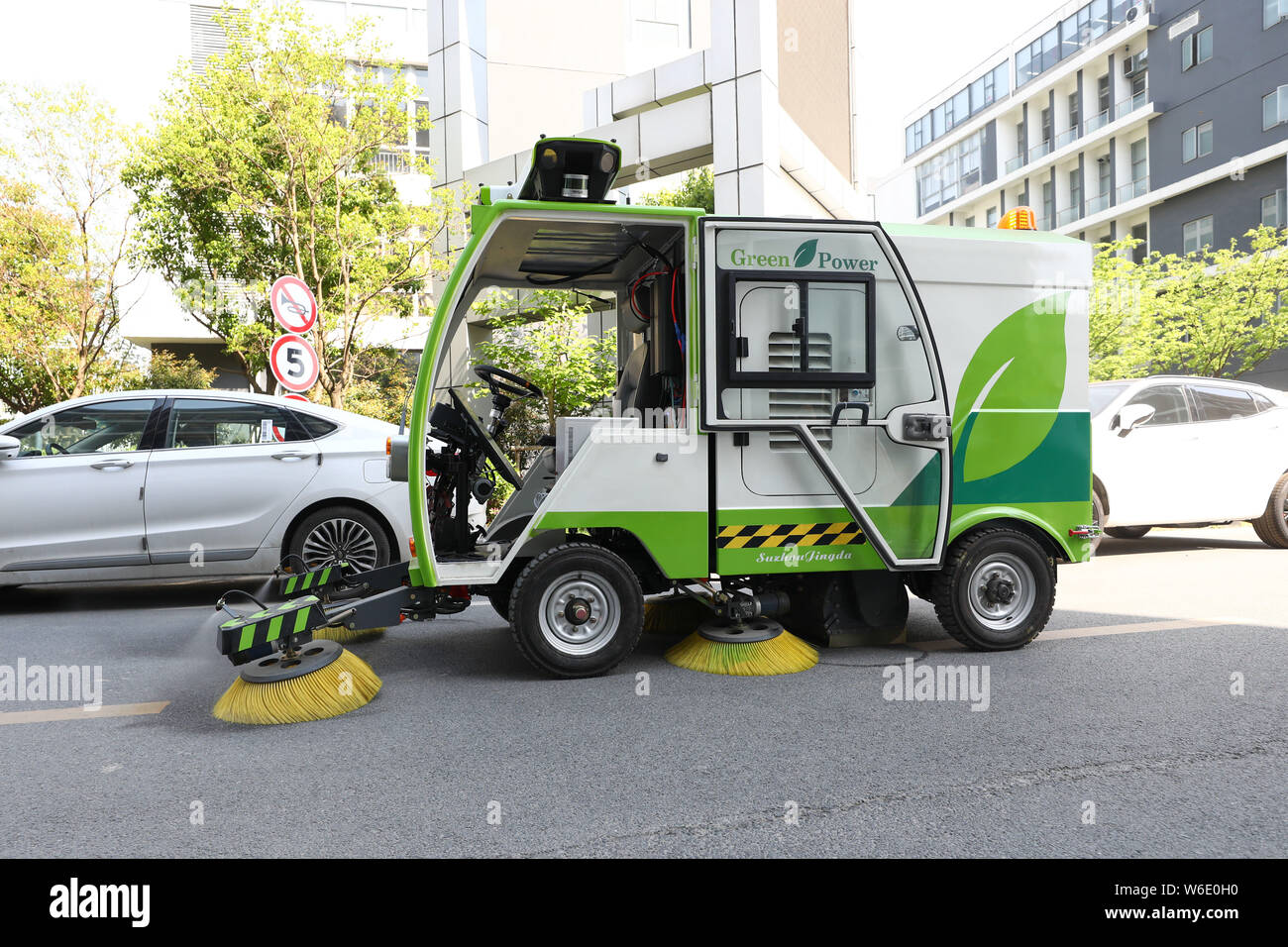 World's first driverless street cleaning truck works on the street in ...