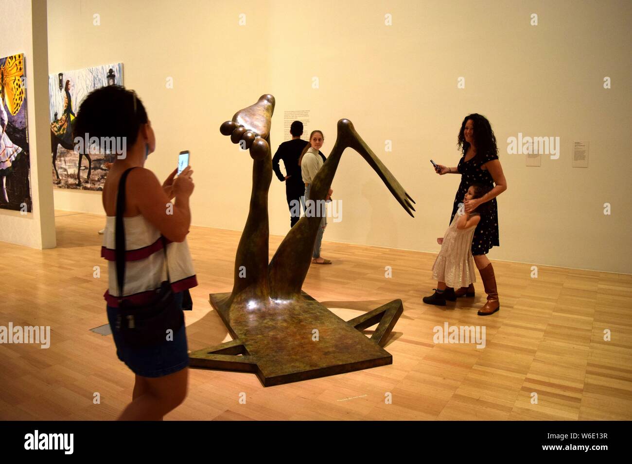 Visitors view an artwork by French artist Camille Henrot on display ...
