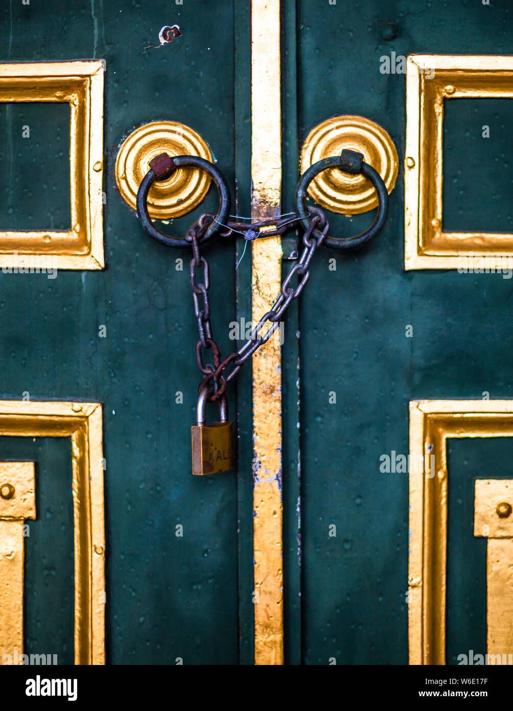 Door locked with chain, padlock and seal seal in Topkapı Sarayı, Fatih ...