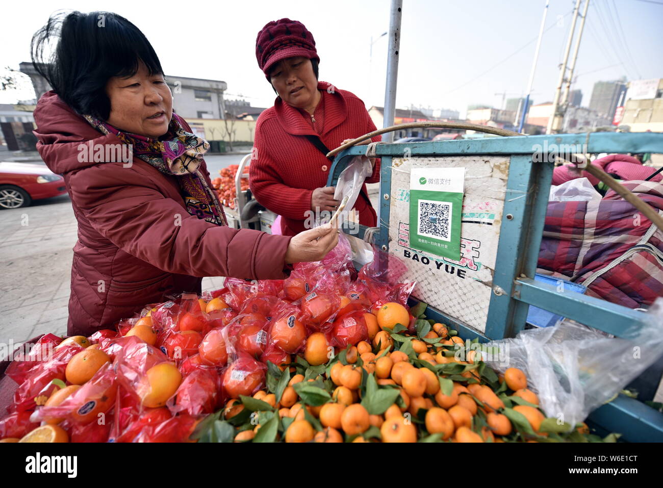 --FILE--A customer has a QR code via mobile payment service Alipay of ...