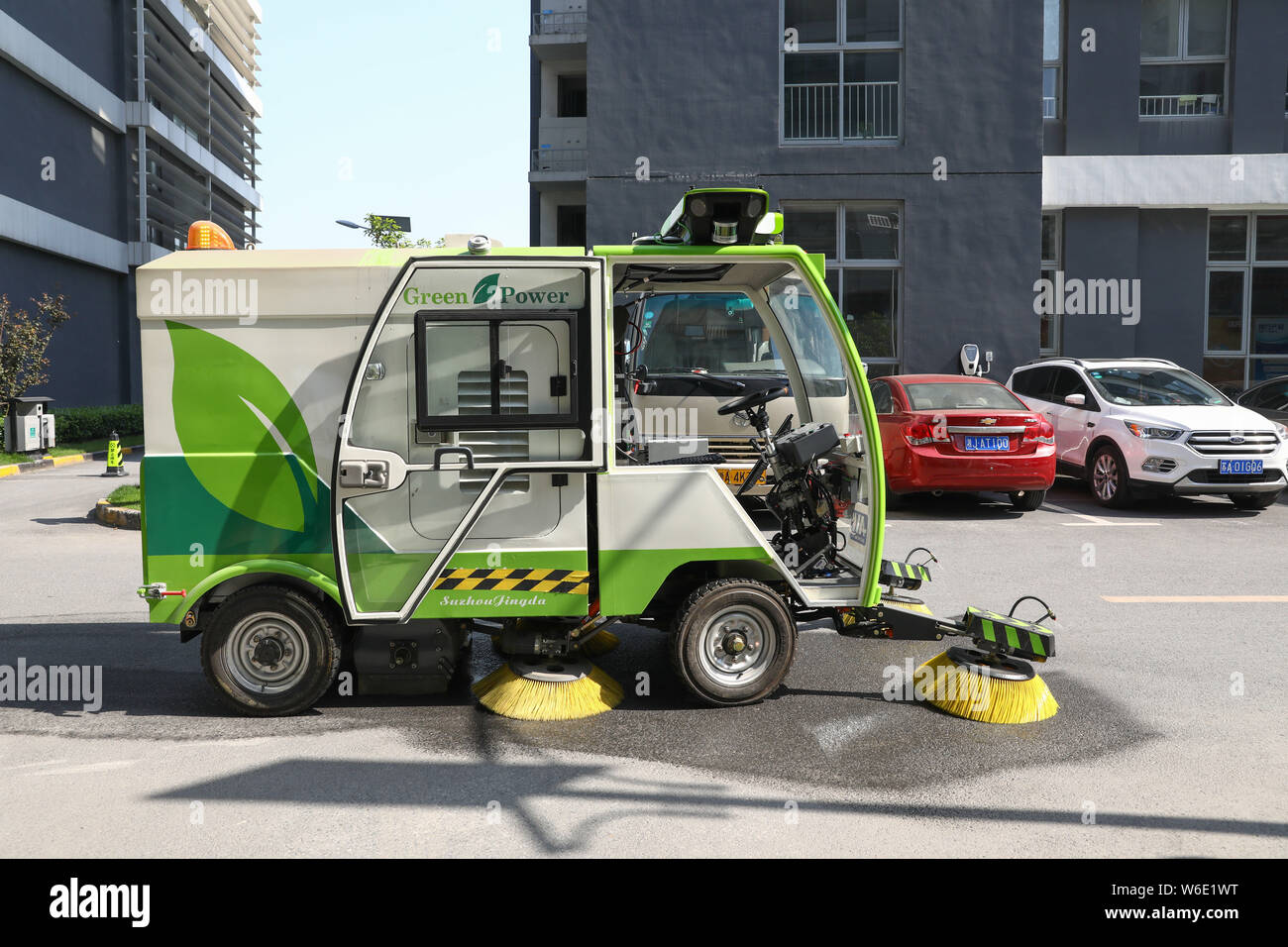 World's first driverless street cleaning truck works on the street in ...