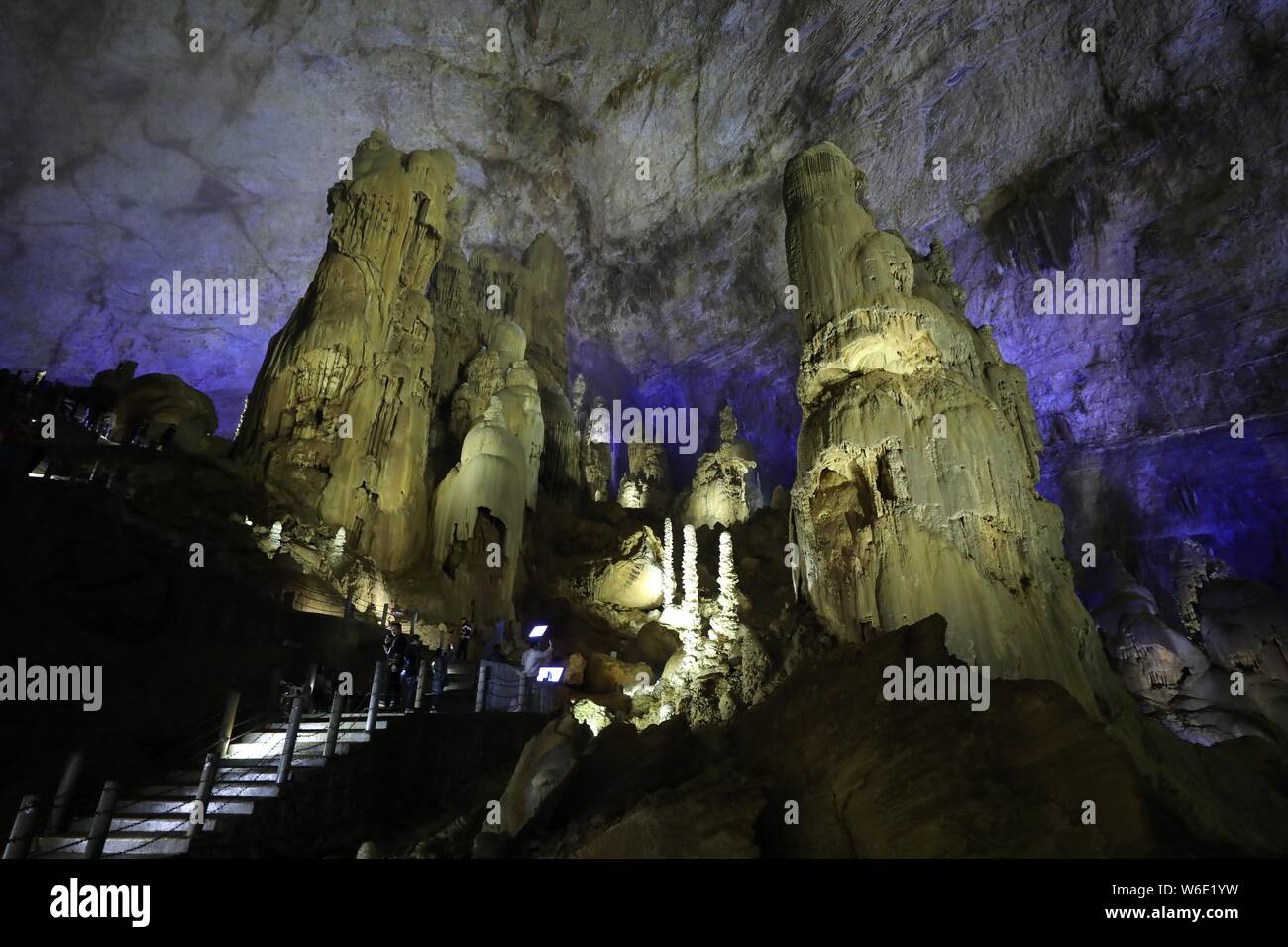 The Zhijin Cave is illuminated by colorful lights in Zhijin county ...