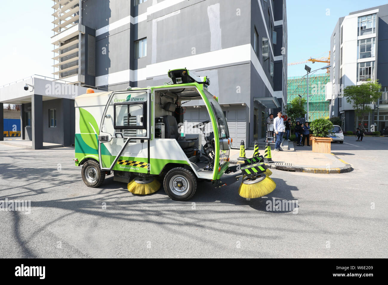 World's first driverless street cleaning truck works on the street in ...
