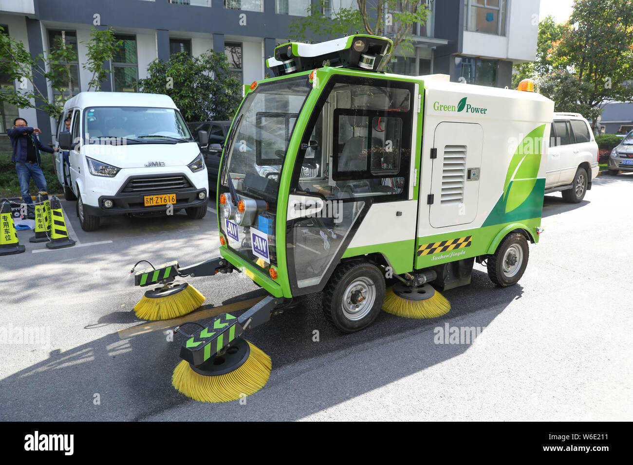 World's first driverless street cleaning truck works on the street in ...