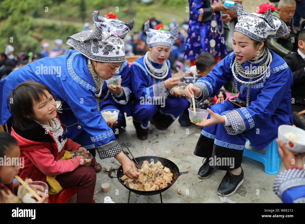 Chinese women and girls of Miao ethnic group dressed in traditional ...