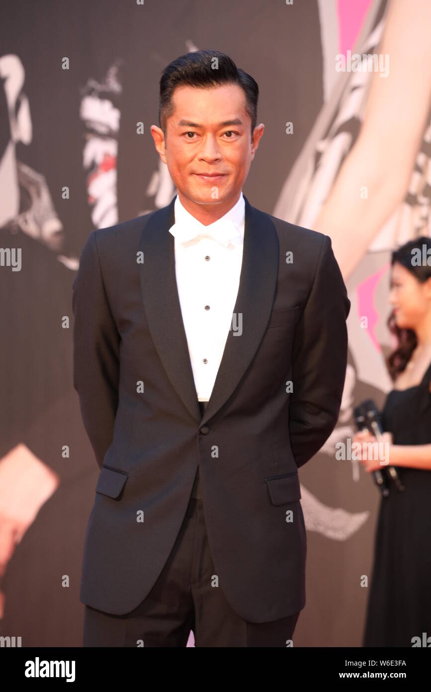 Hong Kong actor Louis Koo arrives on the red carpet for the 37th Hong ...