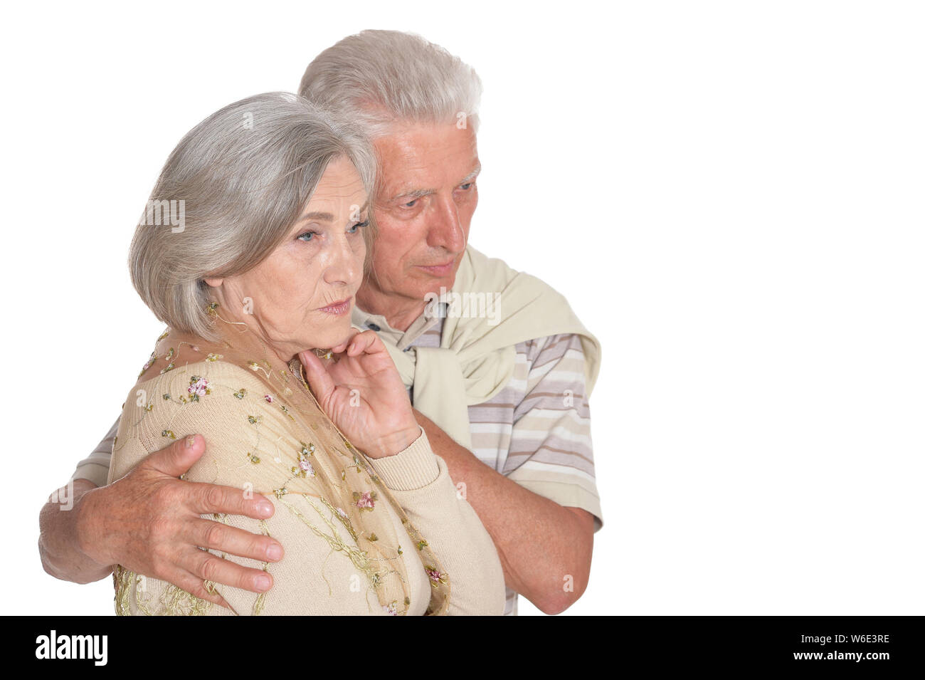 Sad senior couple posing isolated on white background Stock Photo - Alamy
