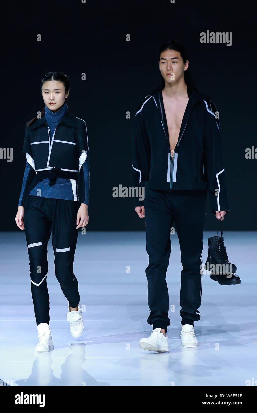 Models display creations of SPORTSWEAR by graduates during a fashion ...