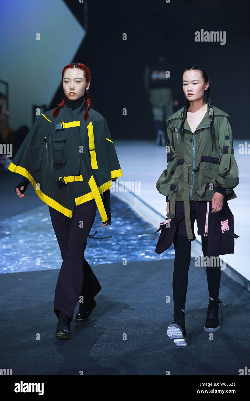 Models display creations of SPORTSWEAR by graduates during a fashion ...